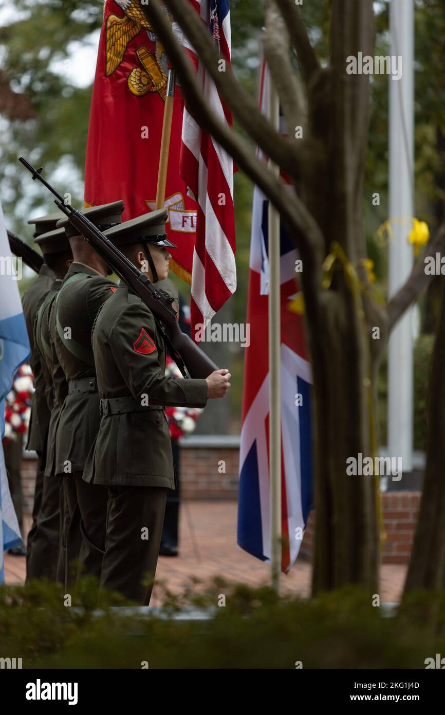 The 1st Battalion, 8th Marines Color Guard retires the colors during ...