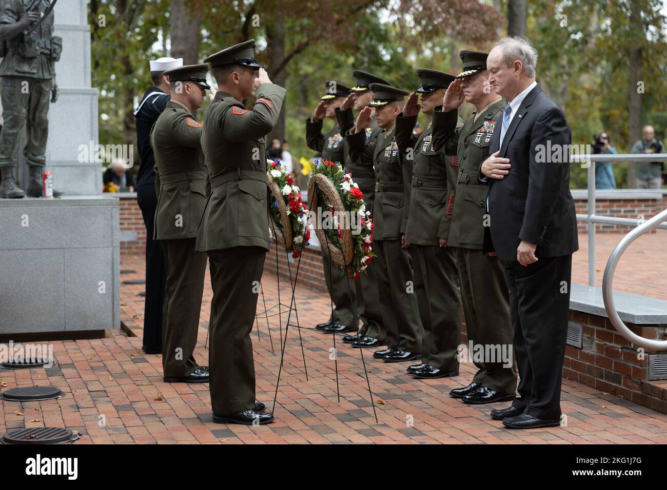 U.S. military service members stand with Mayor Sammy Phillips, city of ...