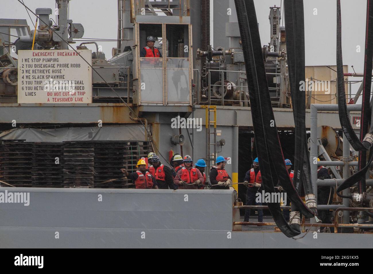 Merchant Mariners assigned to fleet replenishment oiler USNS John ...