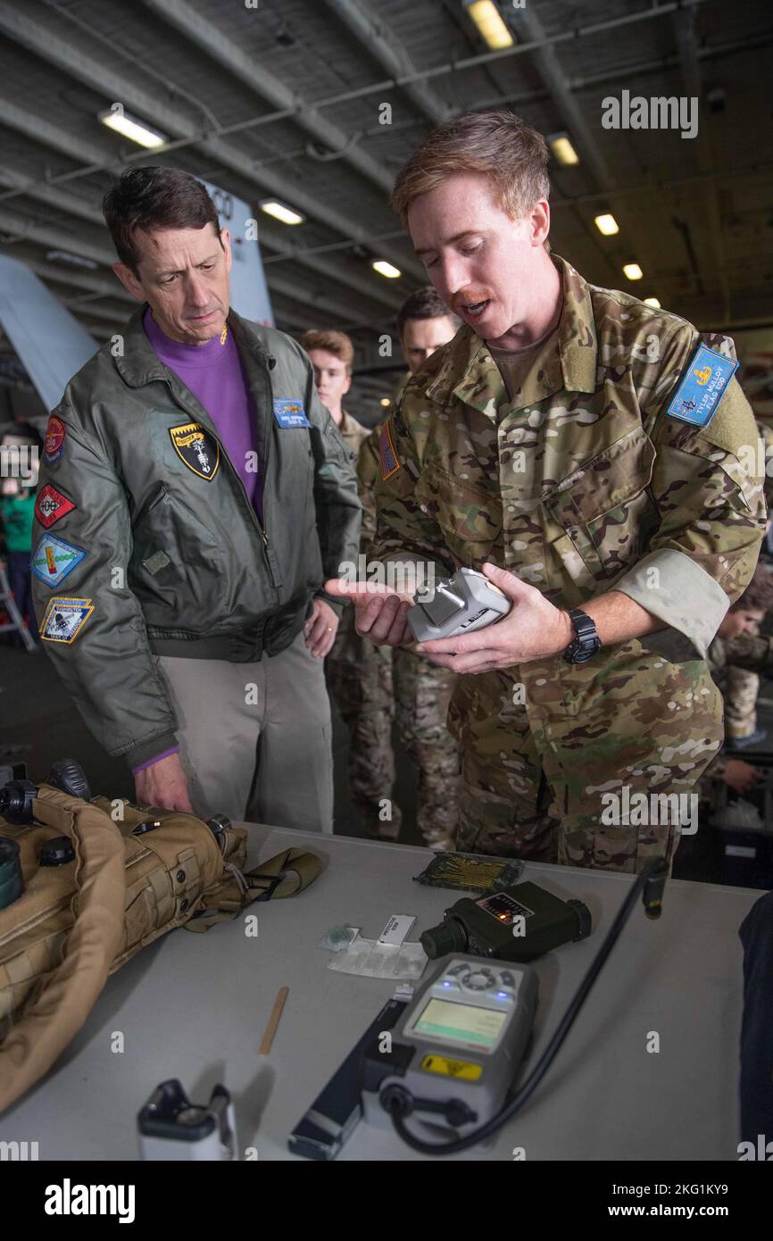 Lt. Tyler Mulloy, from Fairfax, Virginia, right, assigned to Carrier ...