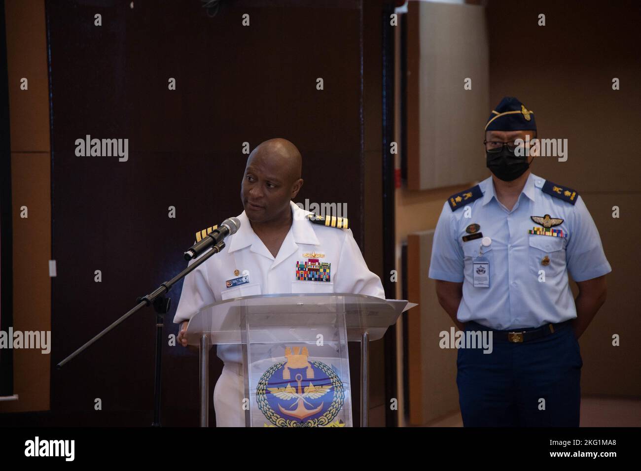 U.S. Navy Capt. Walter C. Mainor, commander of Destroyer Squadron 15 ...