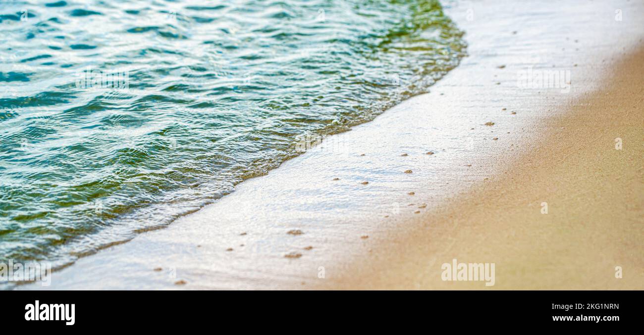 natural background, sandy shore and water closeup Stock Photo - Alamy