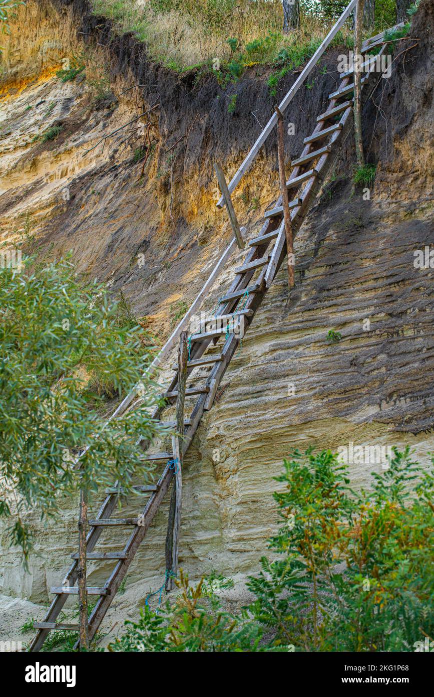 cliff with wooden old stairs closeup, landscape Stock Photo - Alamy