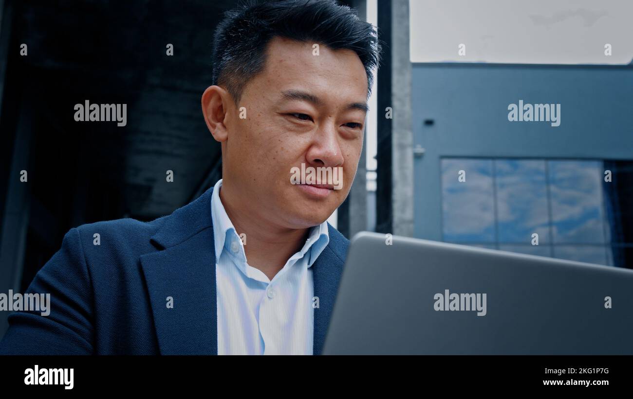 Happy smiling positive Korean Chinese 40s middle-aged businessman ...