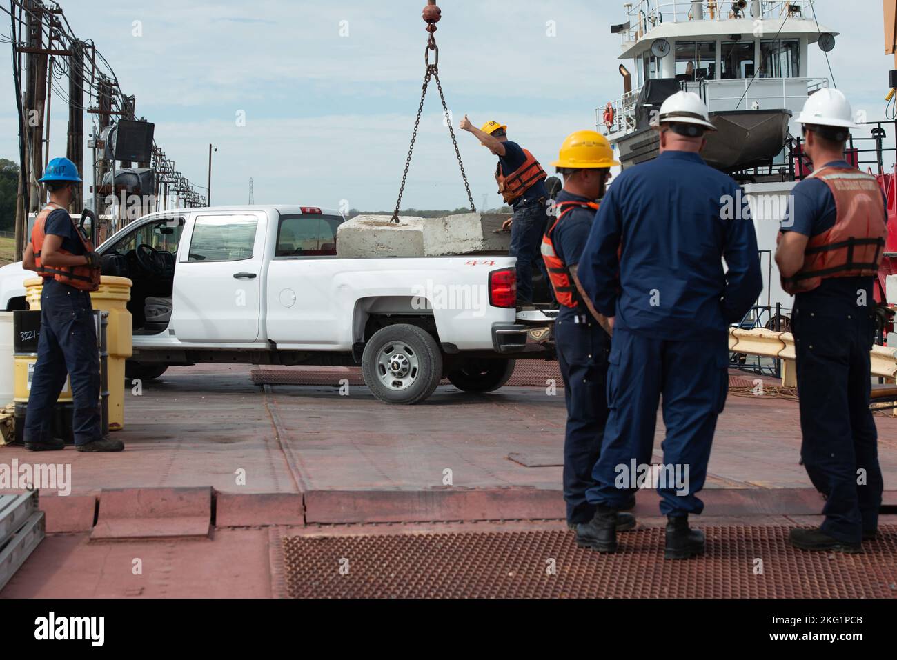 Coast Guard Cutter Patoka crew loads cement weights on Coast Guard ...