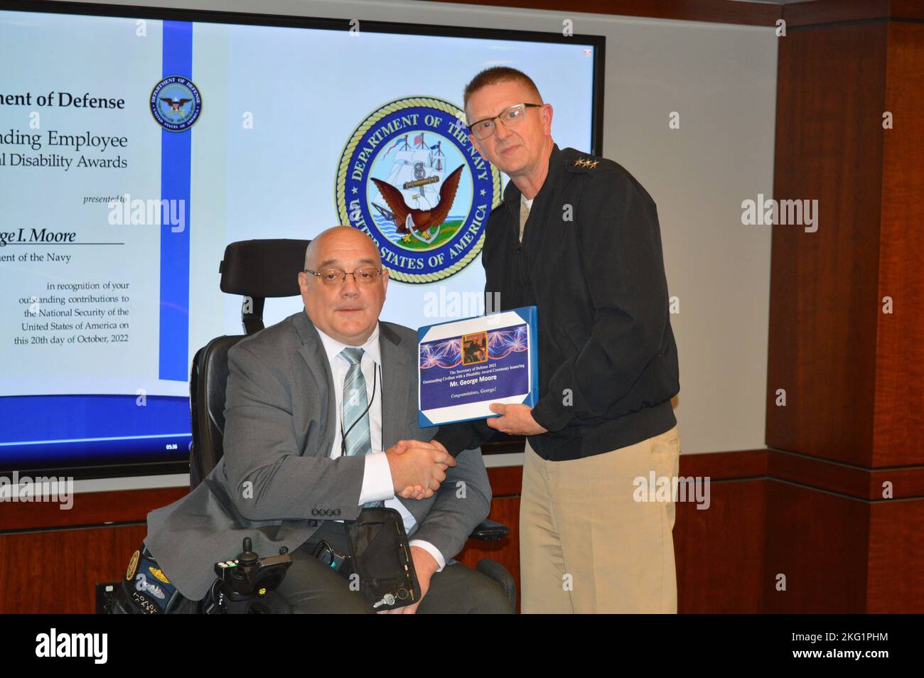 WASHINGTON (Oct. 24, 2022) – Mr. George Moore (left), program analyst ...