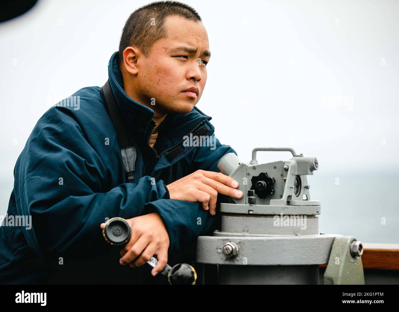 Ensign Sean Tan, assigned to the Arleigh Burke-class guided-missile ...