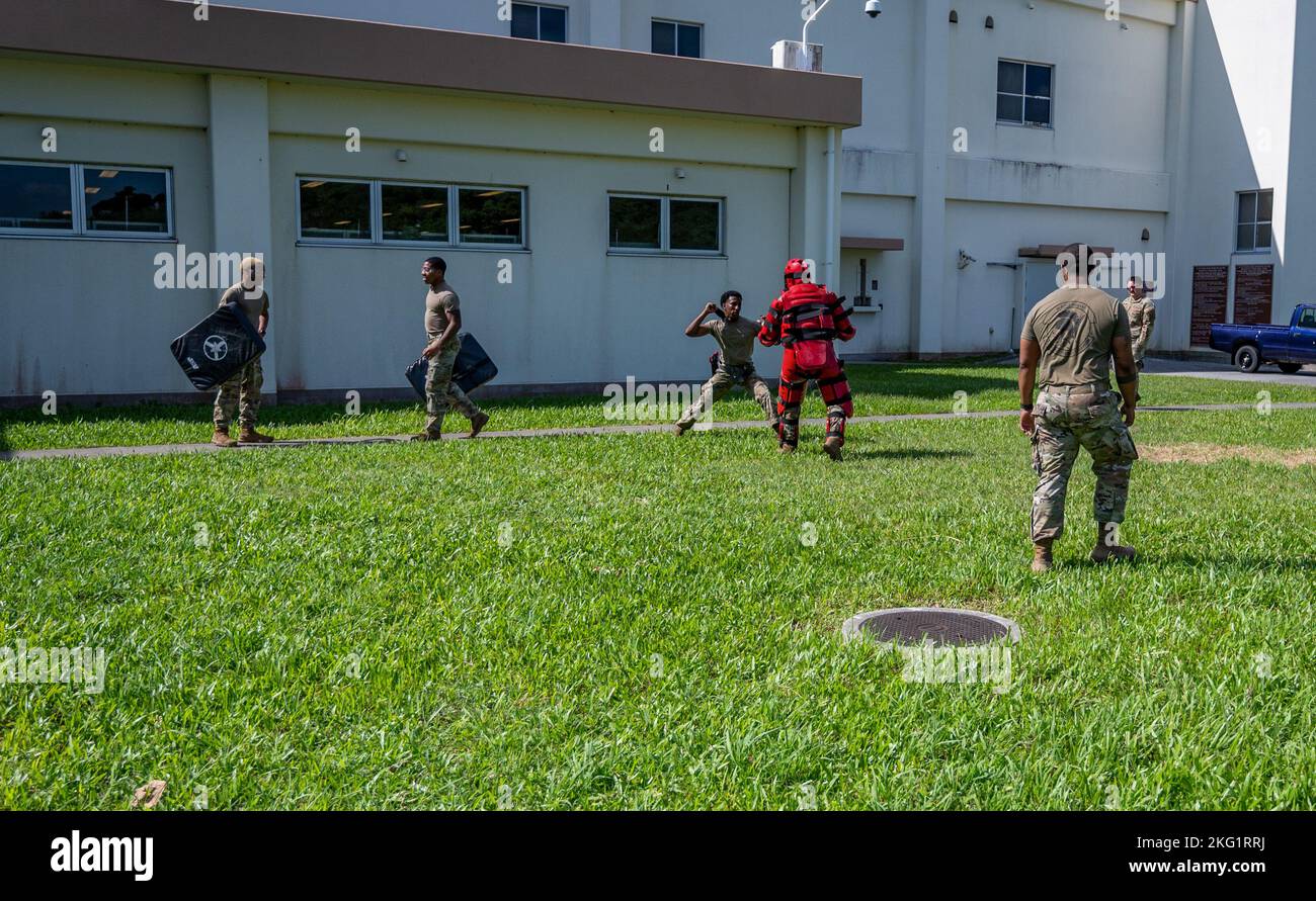 Airmen assigned to the 18th Security Forces Squadron conduct an ...
