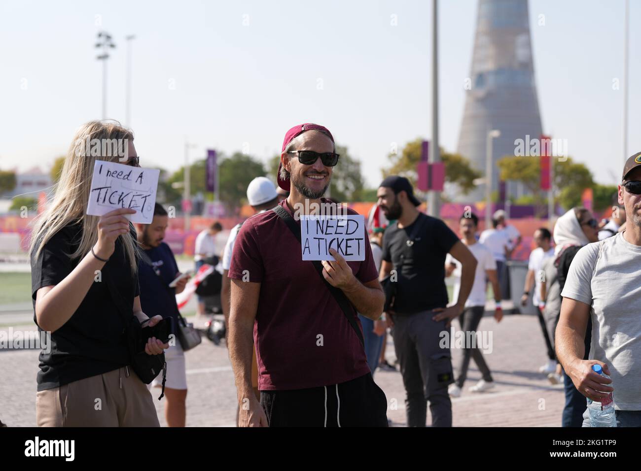 Fans holding a sign 'I Need A Ticket' in Qatar, during the FIFA World ...