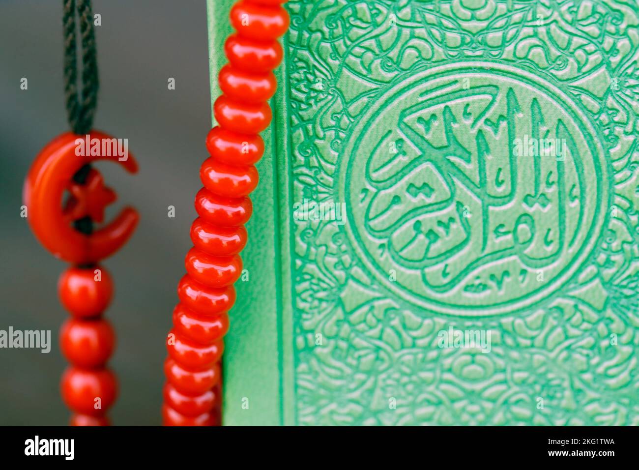 Holy Quran in Arabic and muslim prayer beads. Islam symbols Stock Photo ...