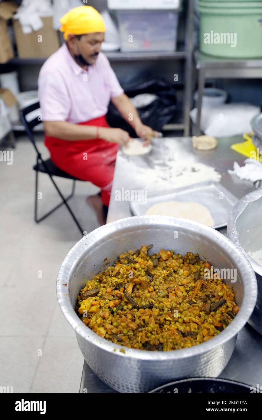 Shiva hindu temple. Man cooking vegetarian meal for lunch. Dubai ...