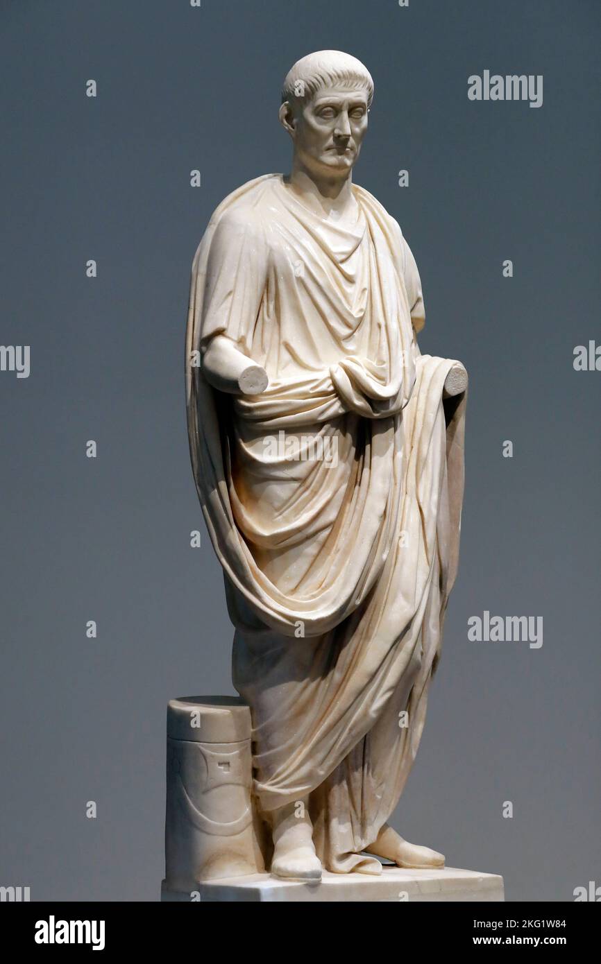 Louvre Abu Dhabi art and civilisation museum. Man dressed in a Roma ...