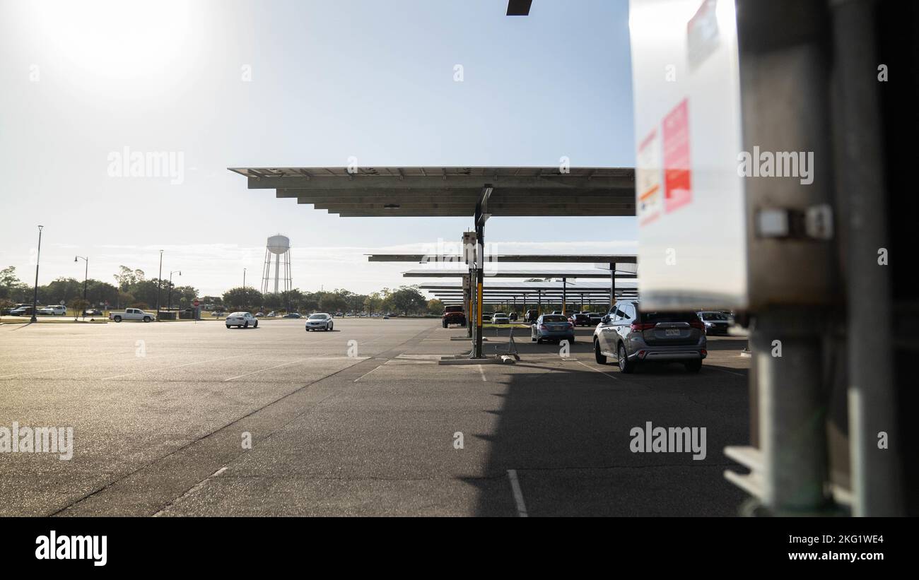 A solar panel array covers the Commissary and Base Exchange parking lot ...