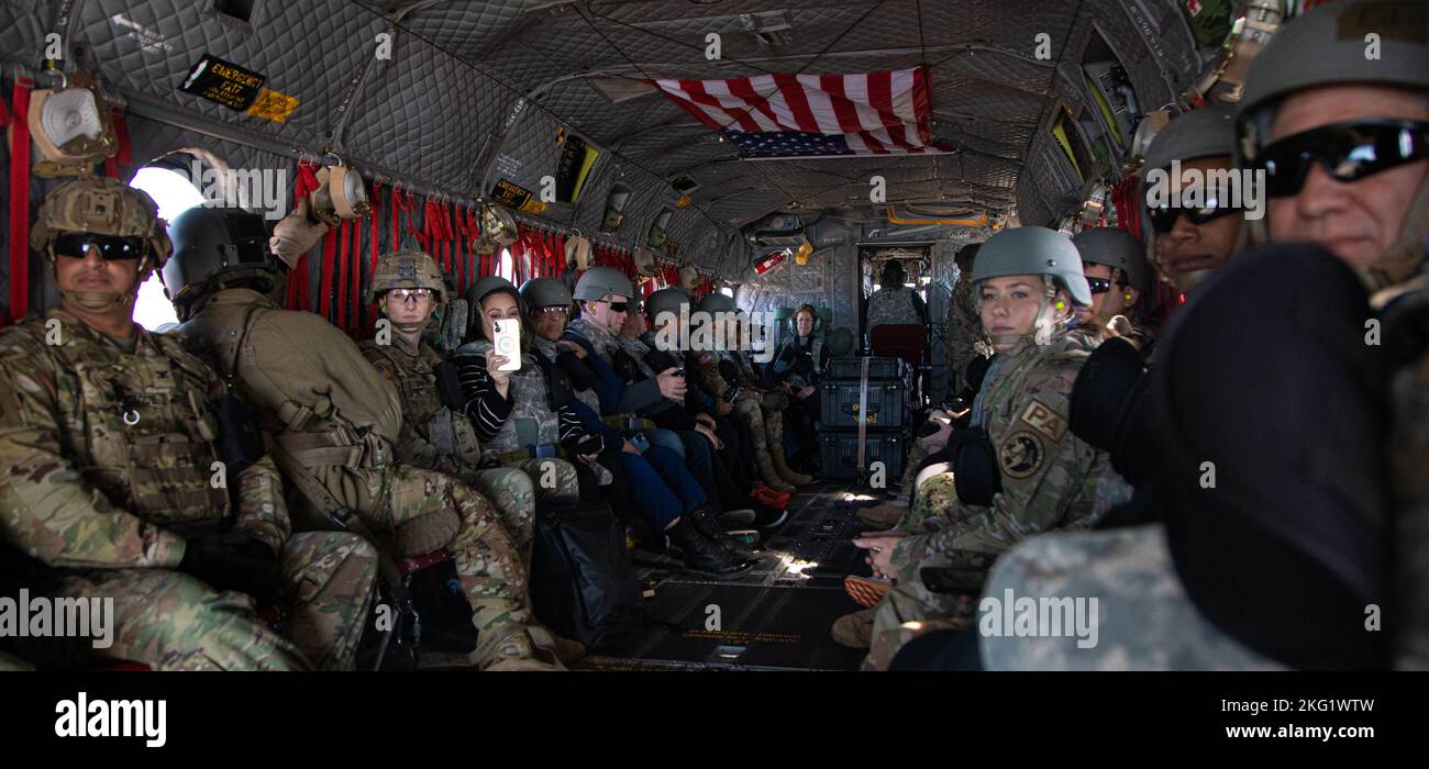 Joint Civilian Orientation Conference participants ride in a Boeing H ...
