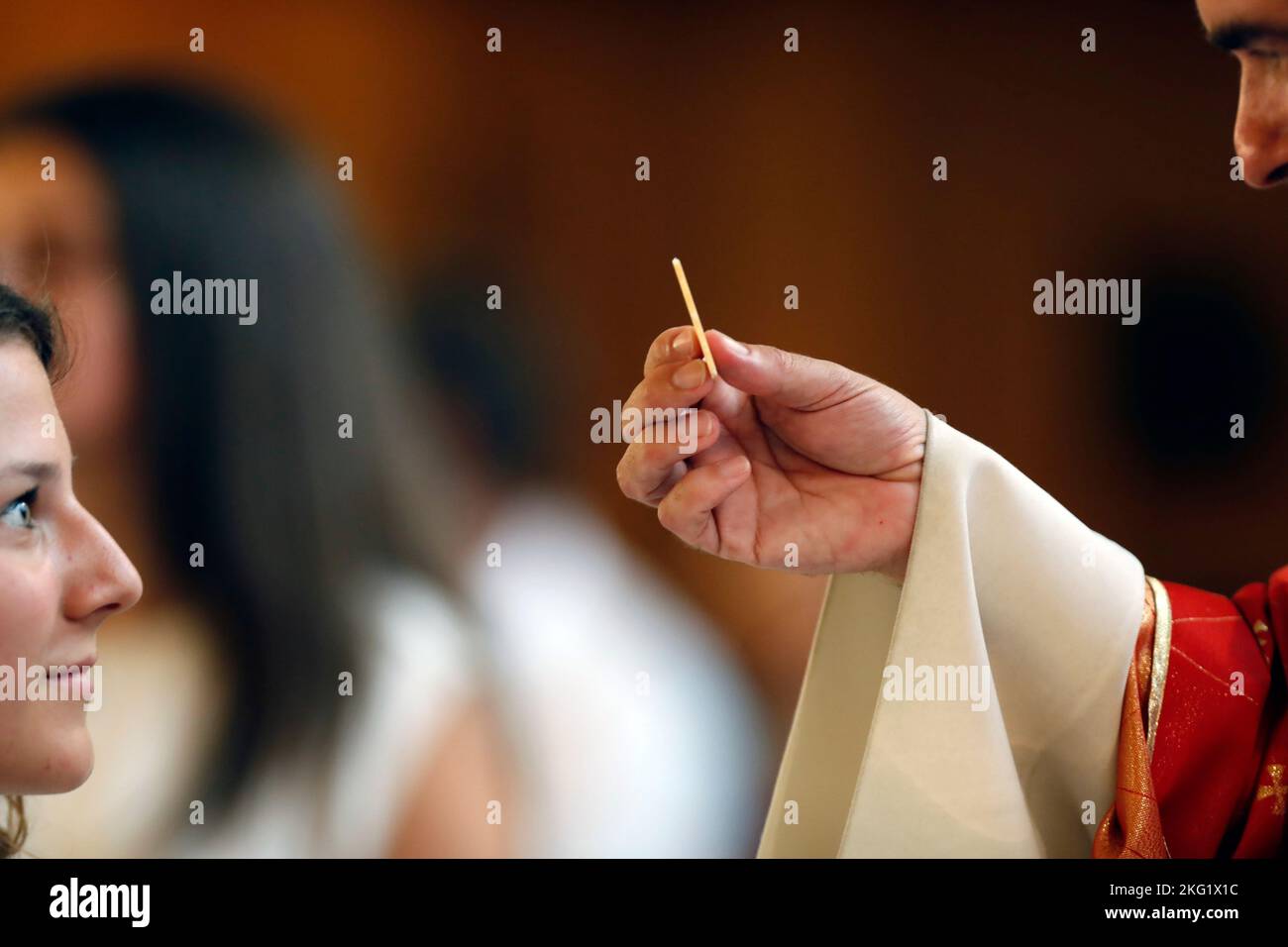 Roman catholic confirmation ceremony in church. Sainte Claire church ...