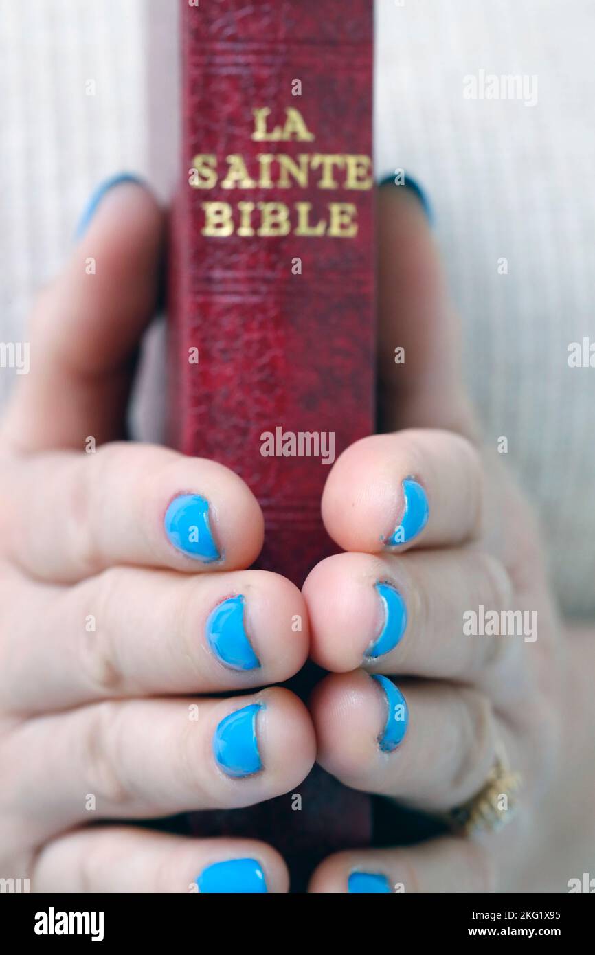 Christian woman with a red the bible. Close up on hands. Concept for ...