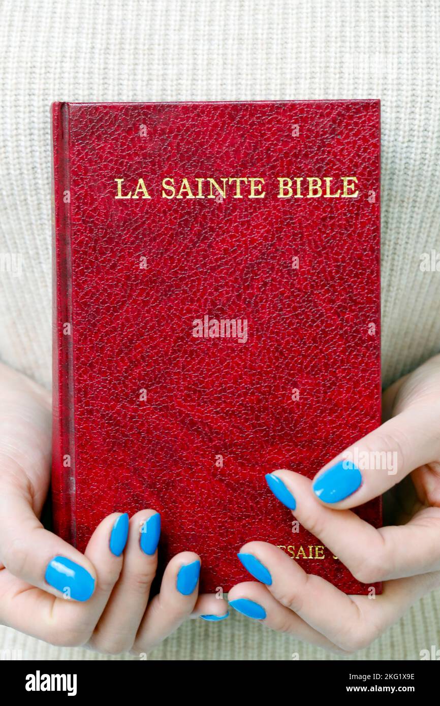Christian woman with a red the bible. Close up on hands. Concept for ...
