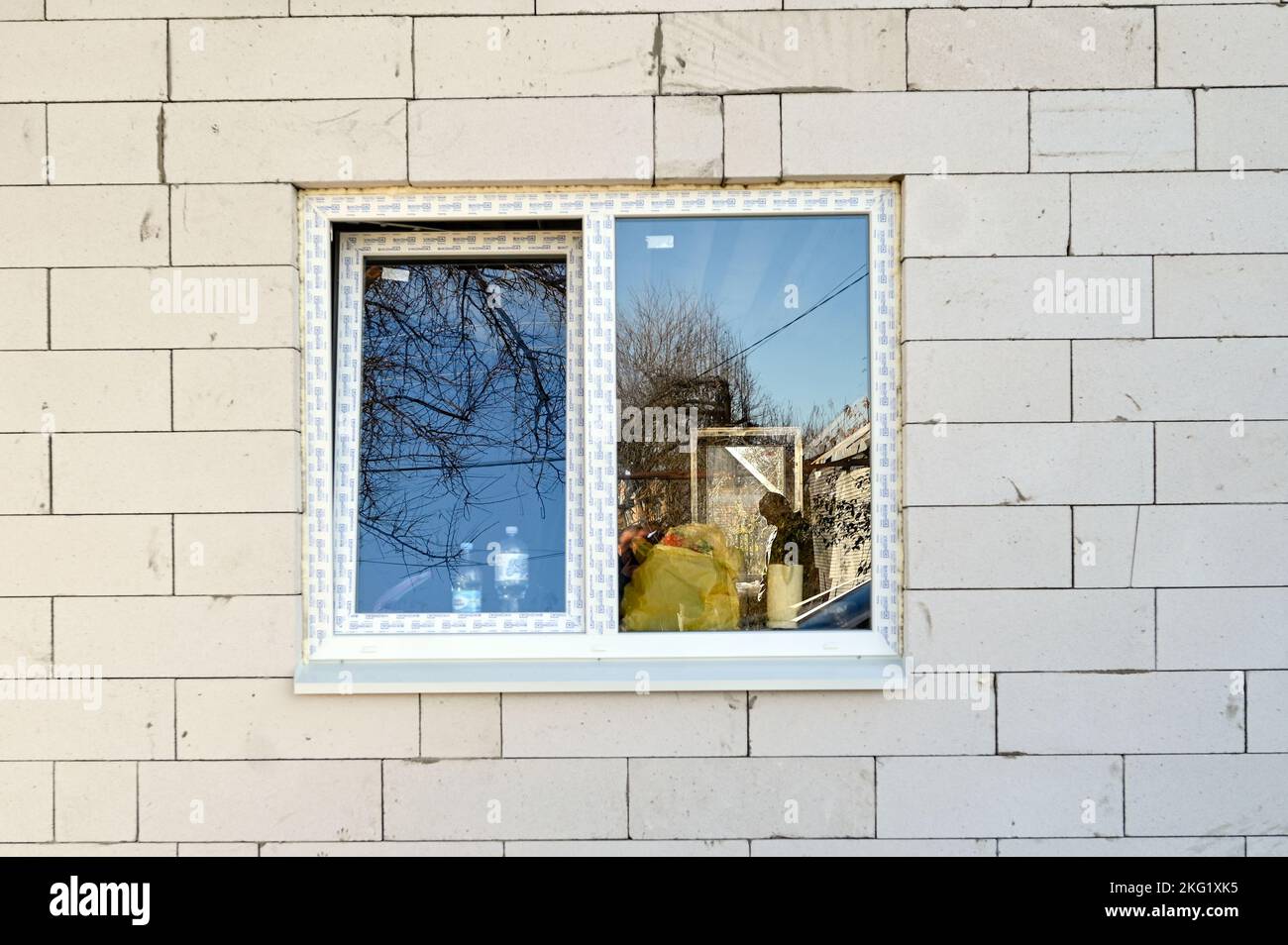 ZAPORIZHZHIA, UKRAINE - NOVEMBER 15, 2022 - A new insulated glass ...
