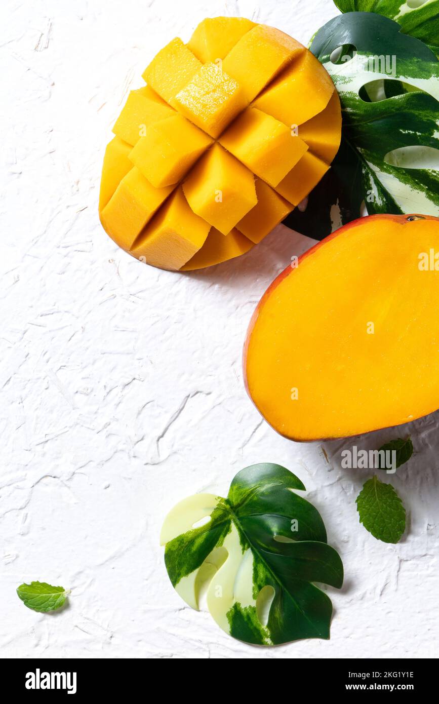 Mango background design concept. Top view of diced fresh mango fruit ...