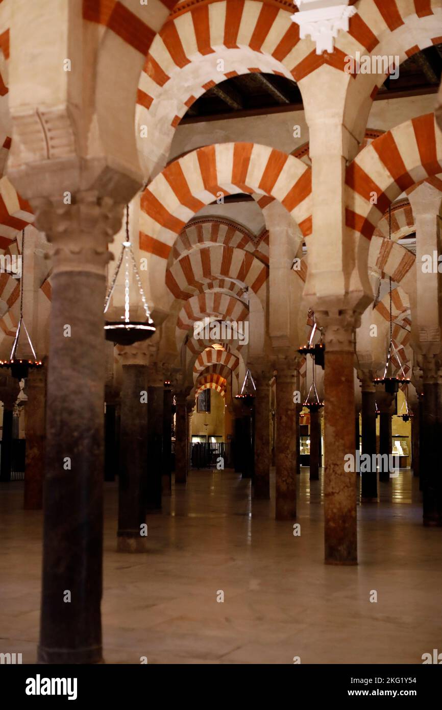Mosque Cathedral of Cordoba. Interior of the Mezquita with red and ...