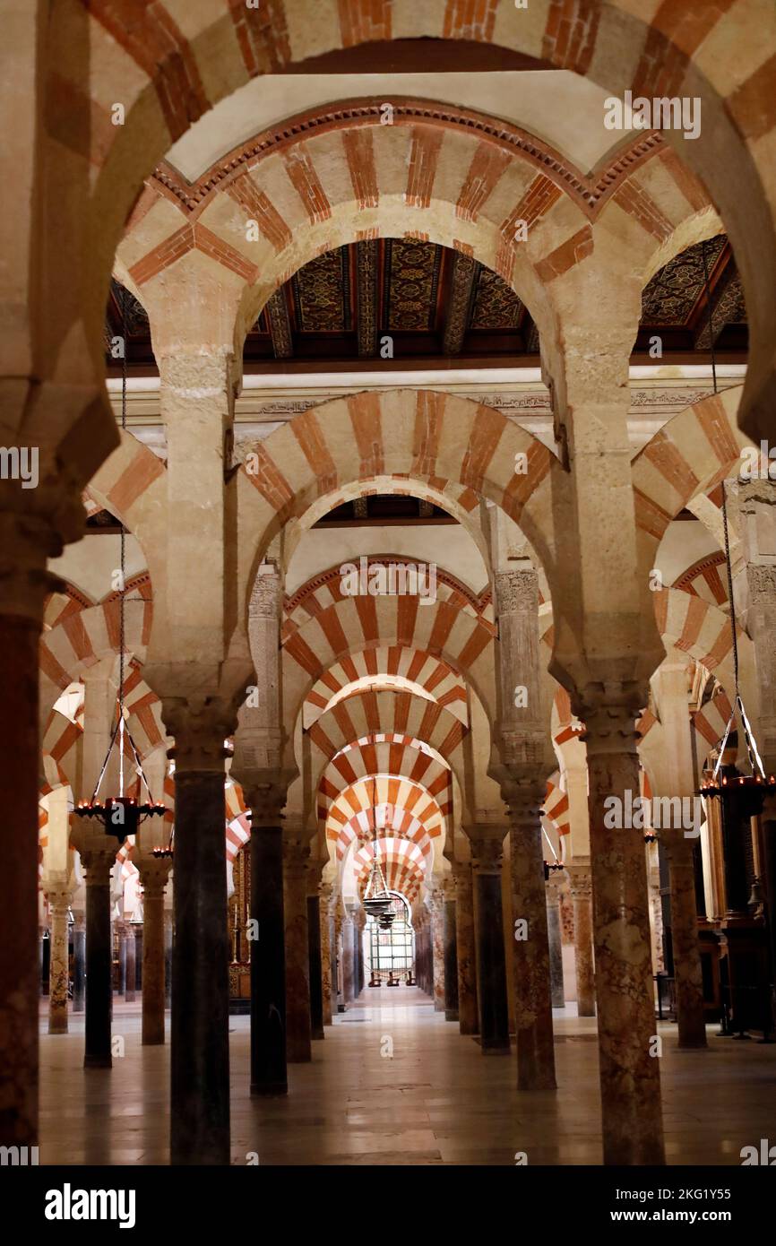 Mosque Cathedral of Cordoba. Interior of the Mezquita with red and ...