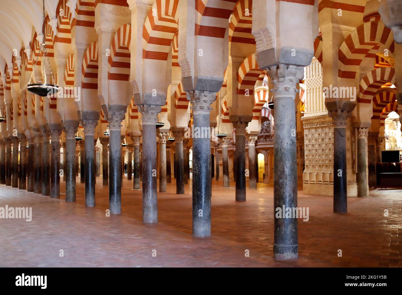 Mosque Cathedral of Cordoba. Interior of the Mezquita with red and ...