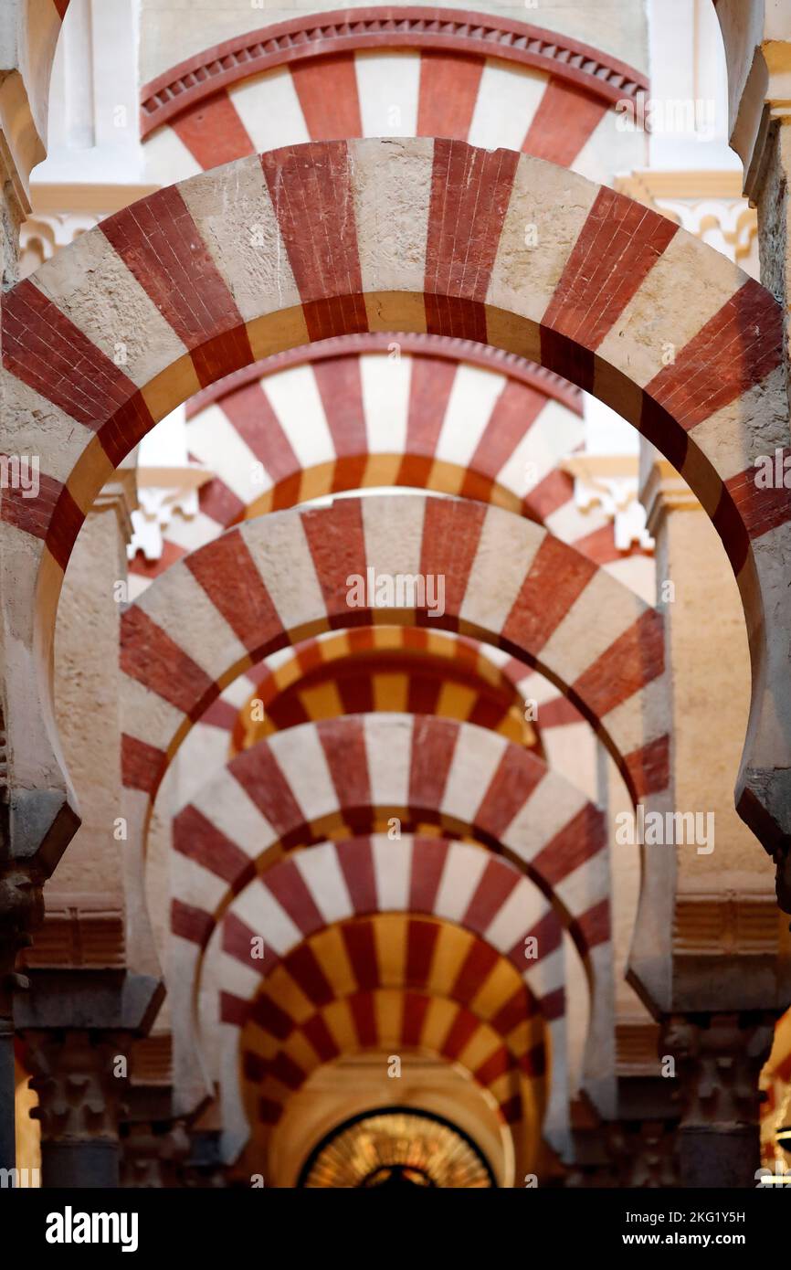 Mosque Cathedral of Cordoba. Interior of the Mezquita with red and ...
