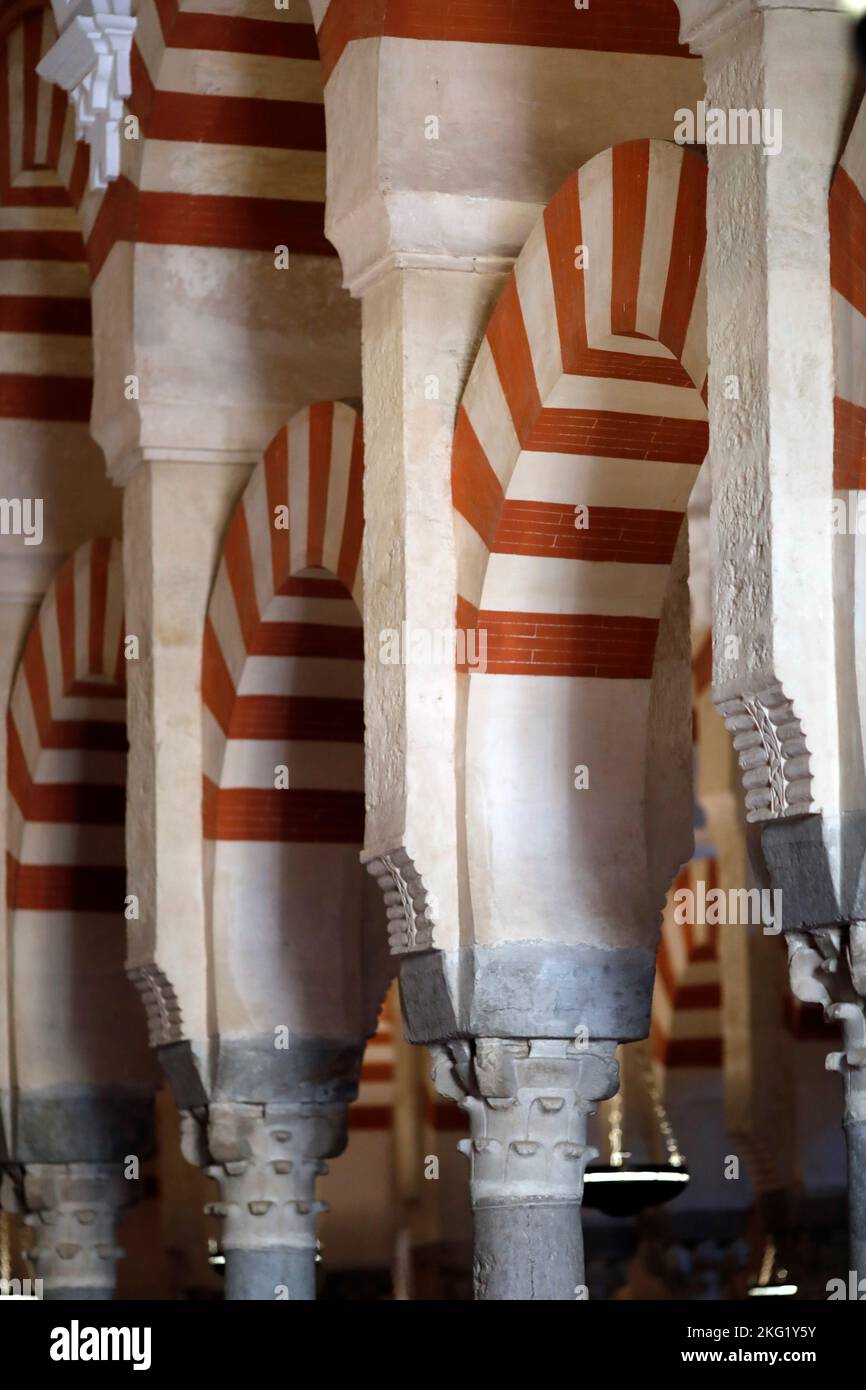 Mosque Cathedral of Cordoba. Interior of the Mezquita with red and ...
