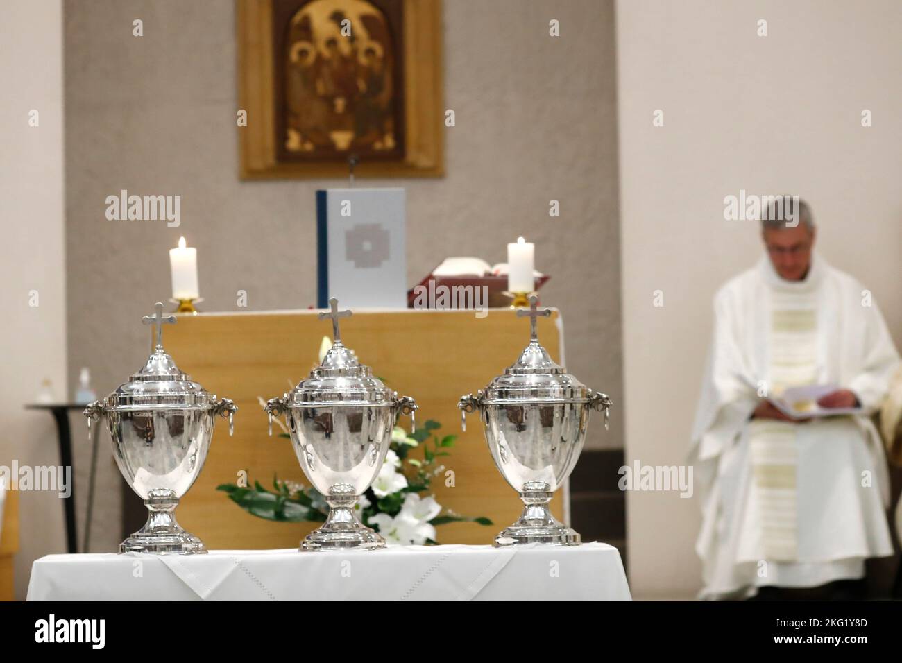Saint Julien en Genevois church. Holy Thursday. Chrism Mass. Holy oils ...