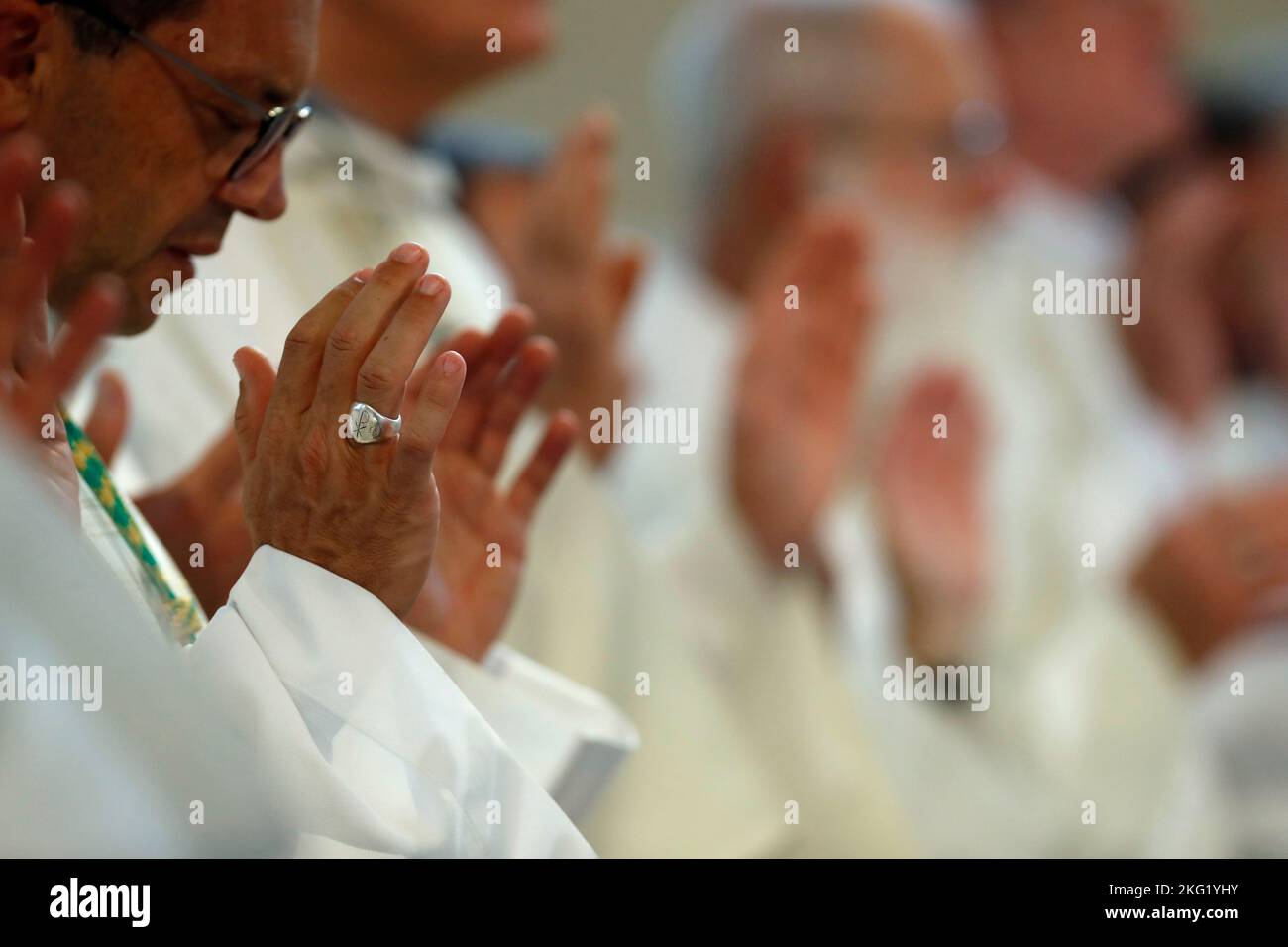 Catholic church. Priest praying at mass. France Stock Photo - Alamy
