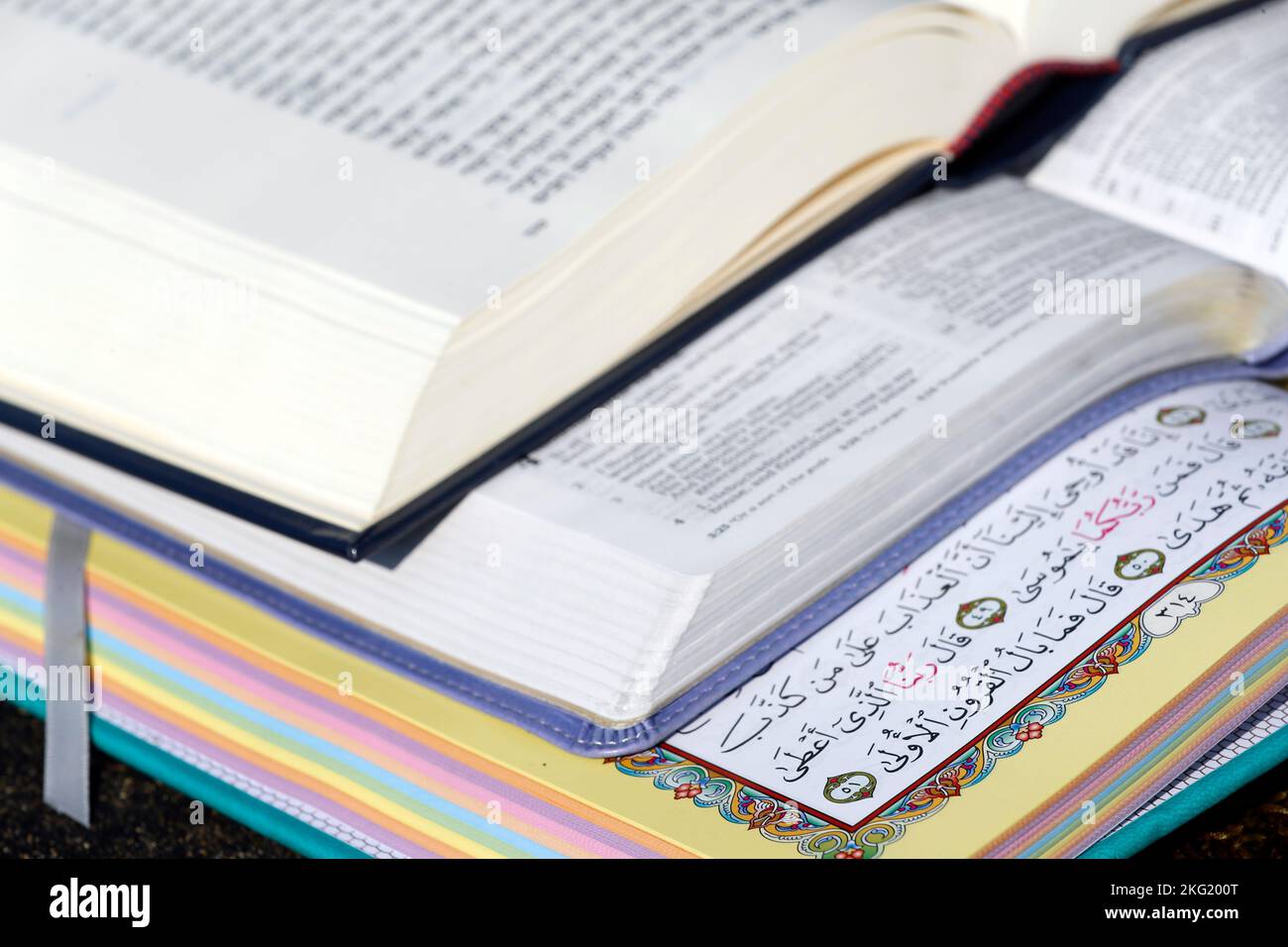 Quran and bible books hi-res stock photography and images - Alamy