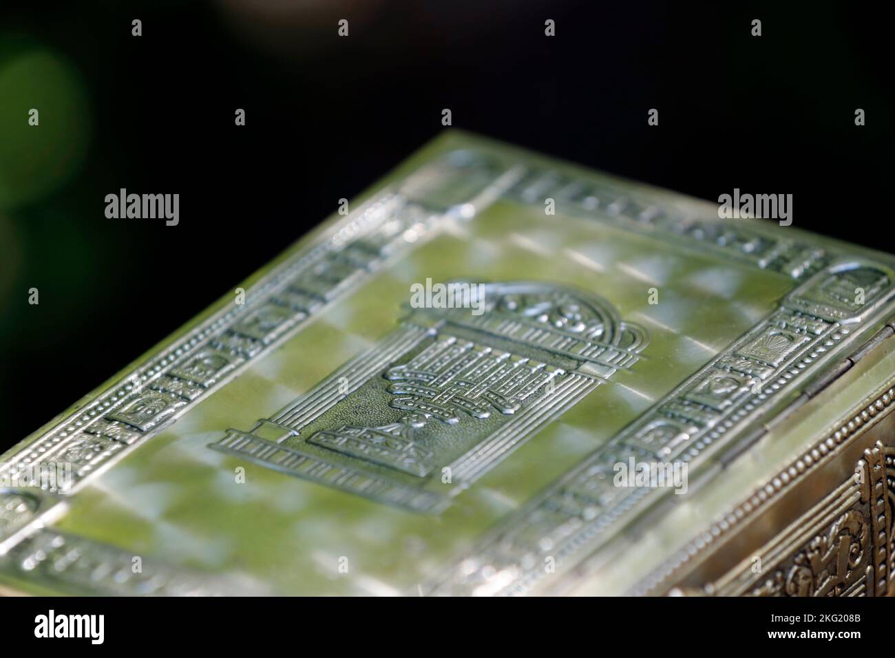 Old Torah book with the the five books of Moses. Cover with a menorah ...