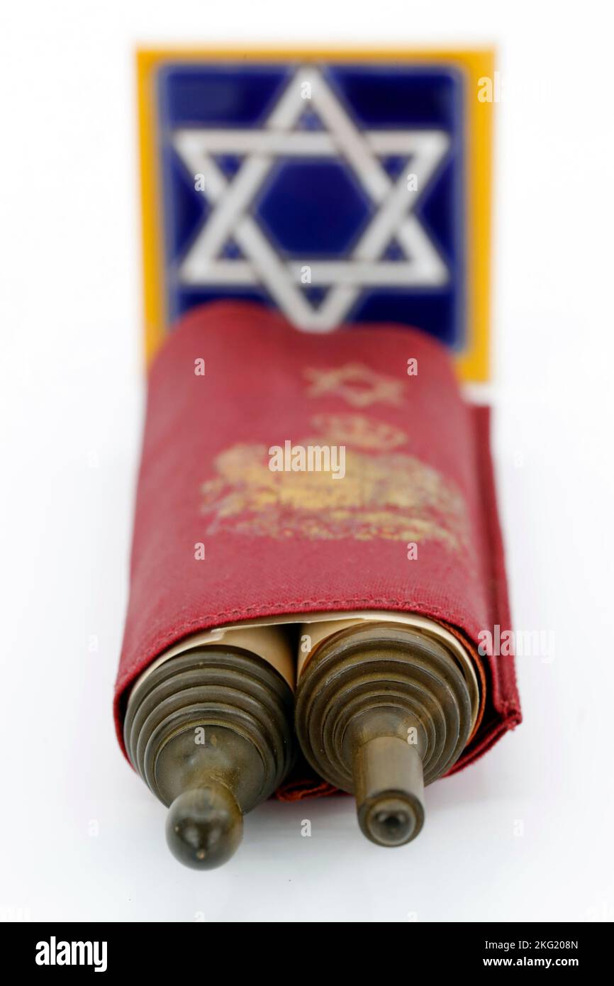 Star of David and small Torah scrolls. Symbol of Jewish identity and ...