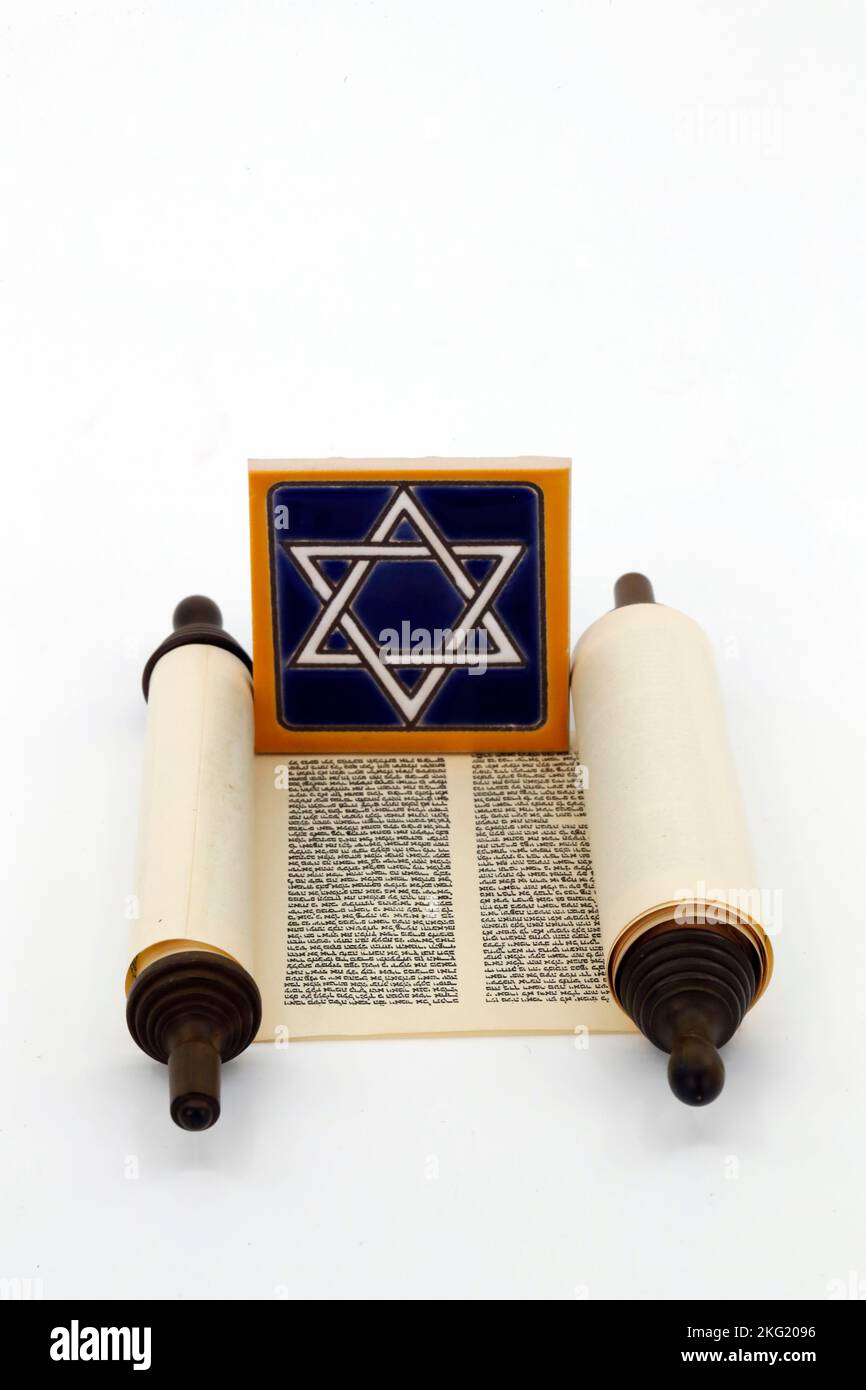 Star of David and small Torah scrolls. Symbol of Jewish identity and ...
