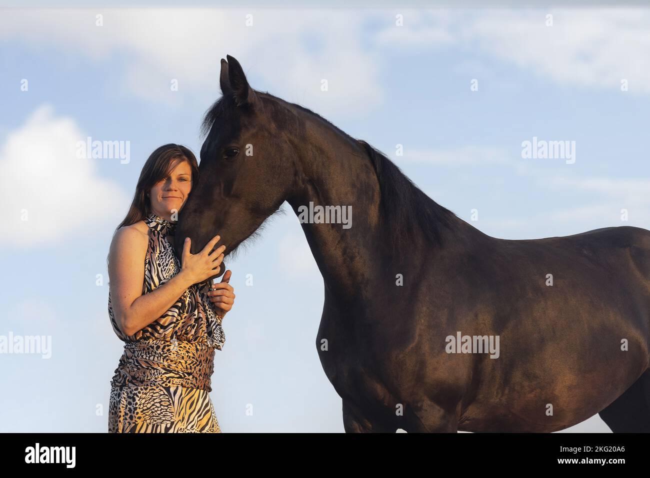 Young woman hugs horse hi-res stock photography and images - Alamy