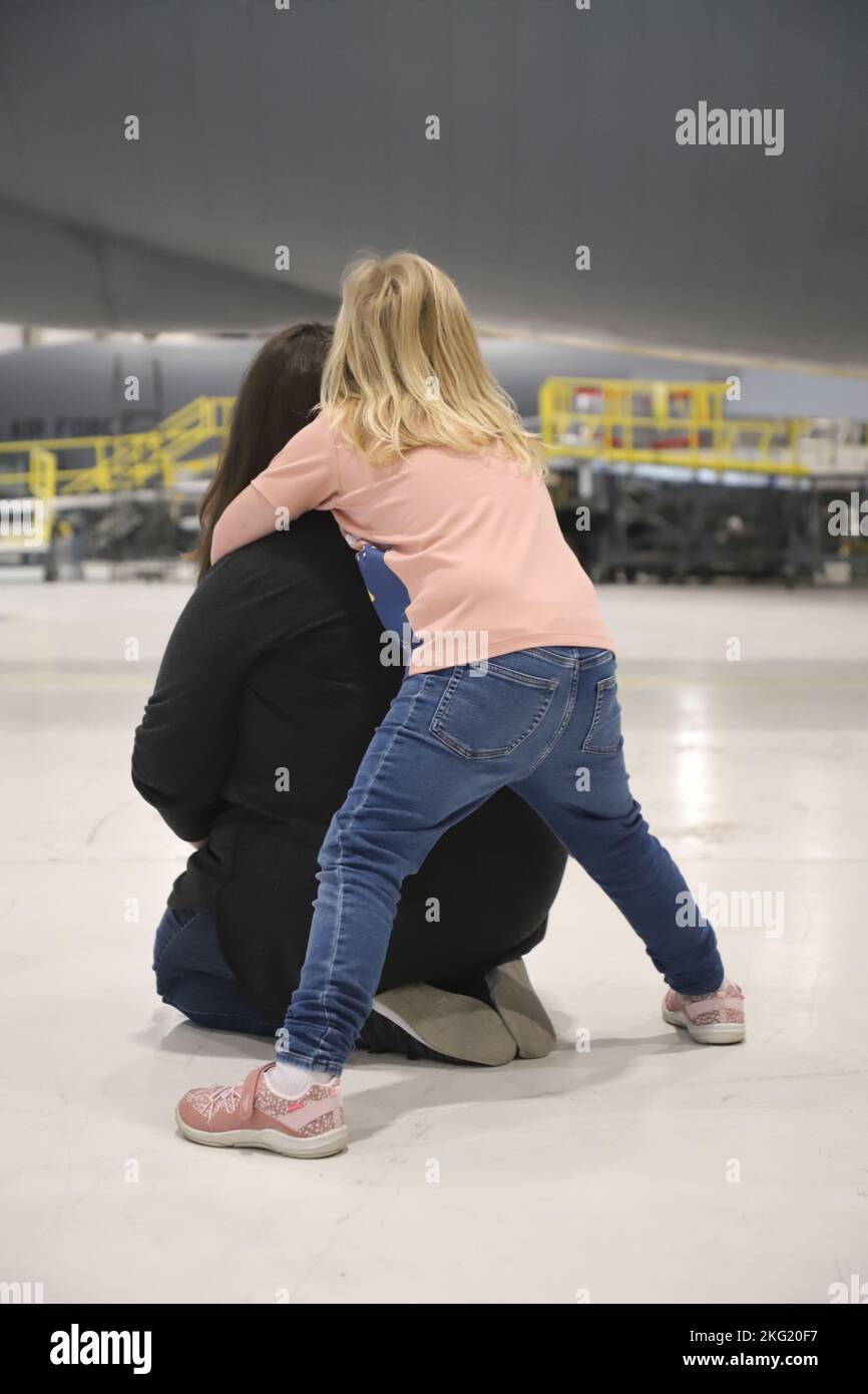 Tinley Benyshek, Pilot for the Day, hugs her mother, Tia Benyshek, at ...
