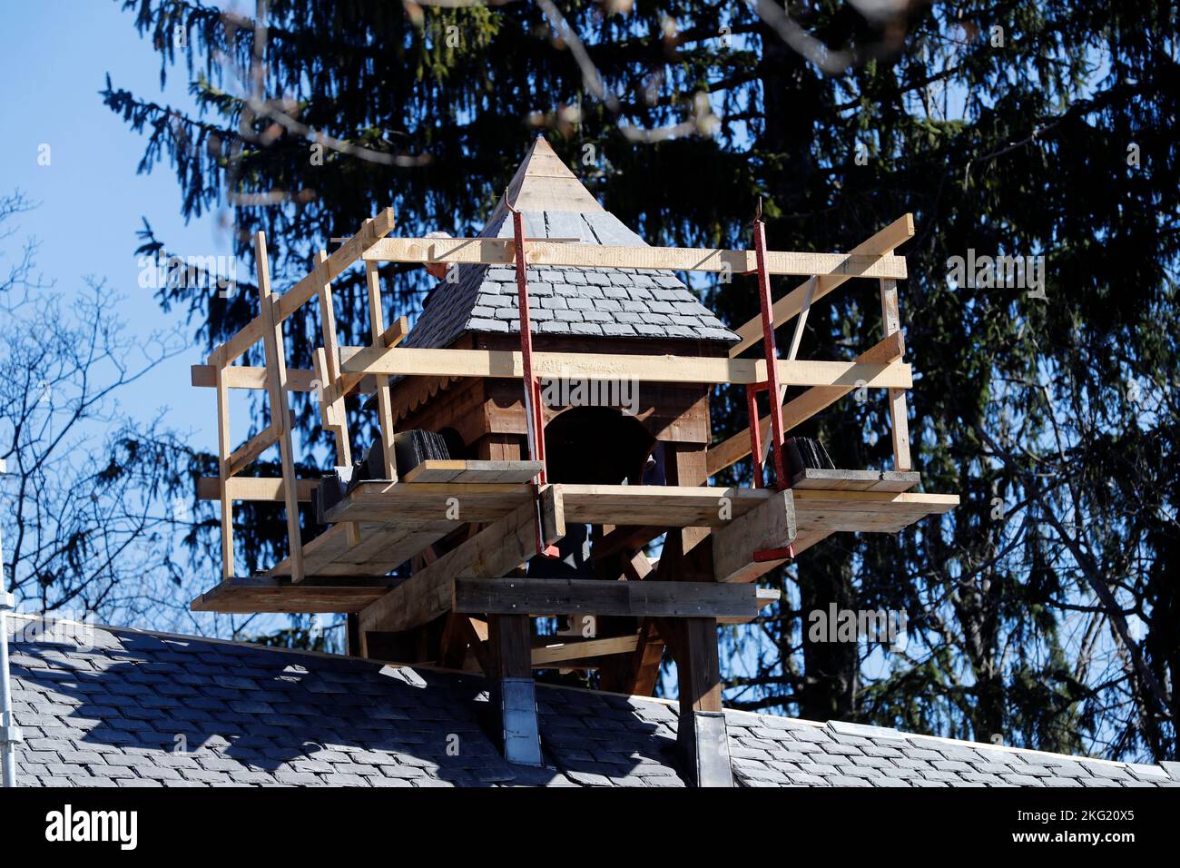 Champoutant baroque chapel during renovation. Bell tower. Carpenter ...