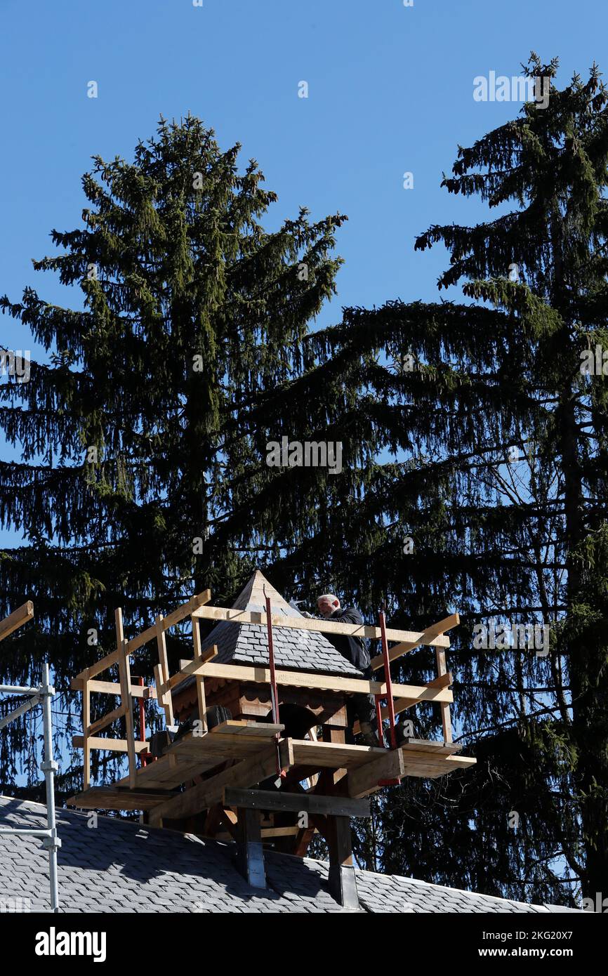Champoutant baroque chapel during renovation. Bell tower. Carpenter ...