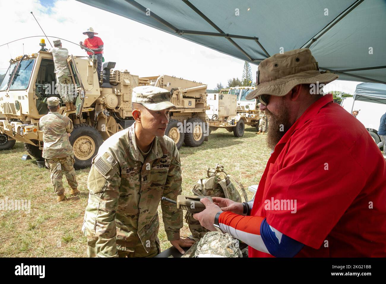 Civilian technicians assist Soldiers assigned to 2nd Battalion, 11th ...