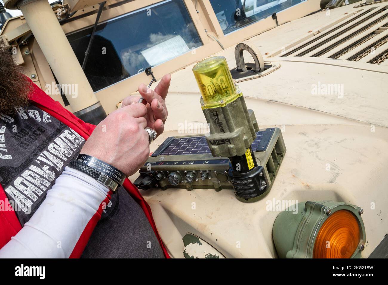 Civilian technicians assist Soldiers assigned to 2nd Battalion, 11th ...
