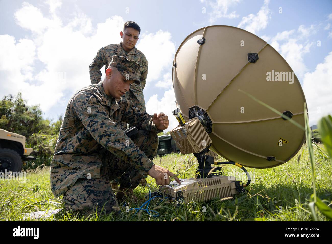 U.S. Marine Corps Lance Cpl. Amado Saltosandrade, left, radio operator ...