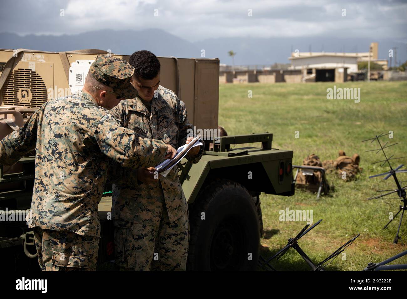 U.S. Marine Corps Gunnery Sgt. Leonel Saucedo, platoon sergeant, and Cpl. Samuel Gusman jr ...