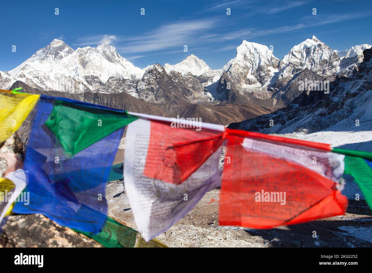 view of Mount Everest, Lhotse and Makalu with buddhist prayer flags ...