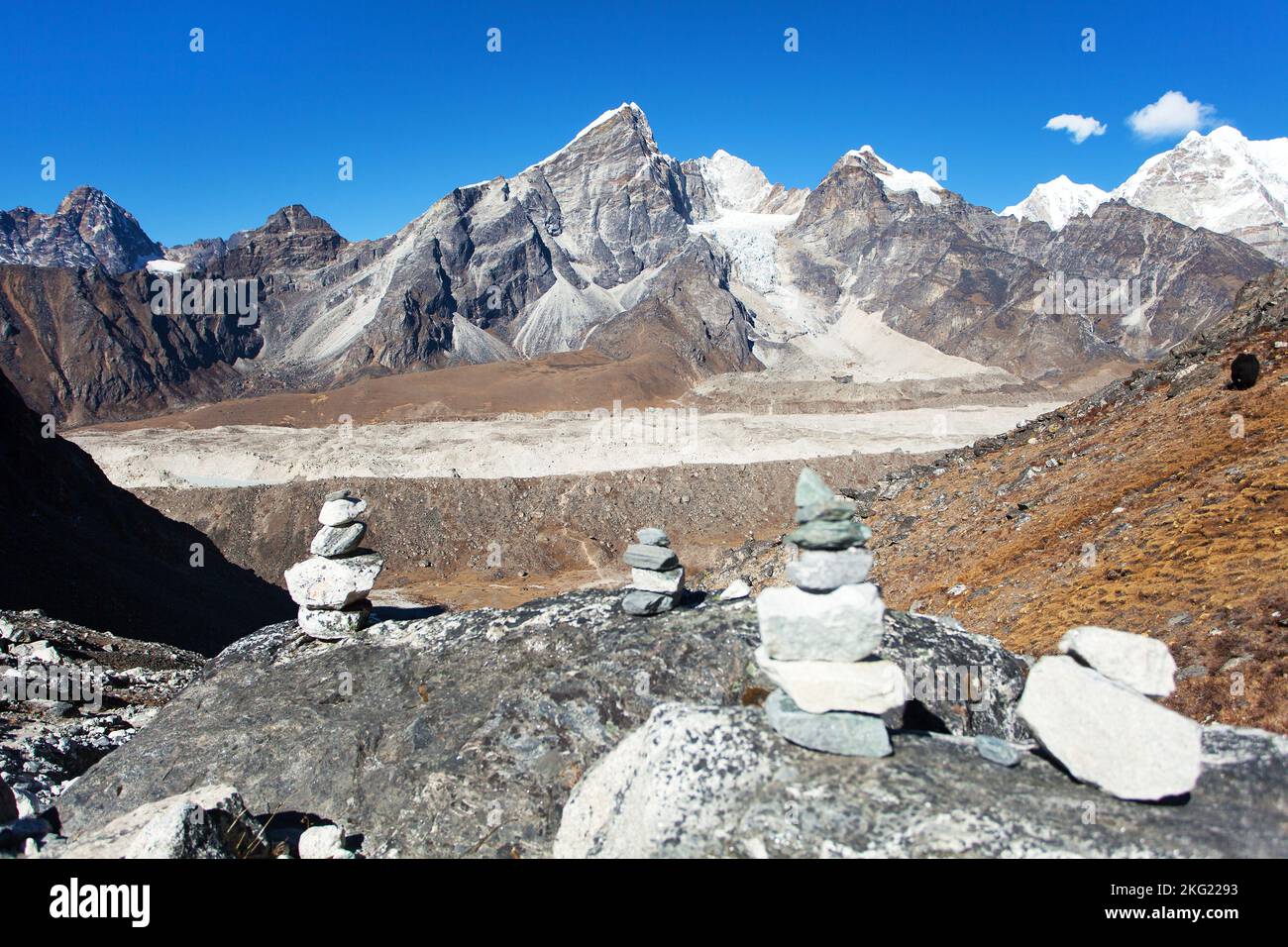 Khumbu glacier and Lobuche peak from Kongma la pass with stone pyramids ...