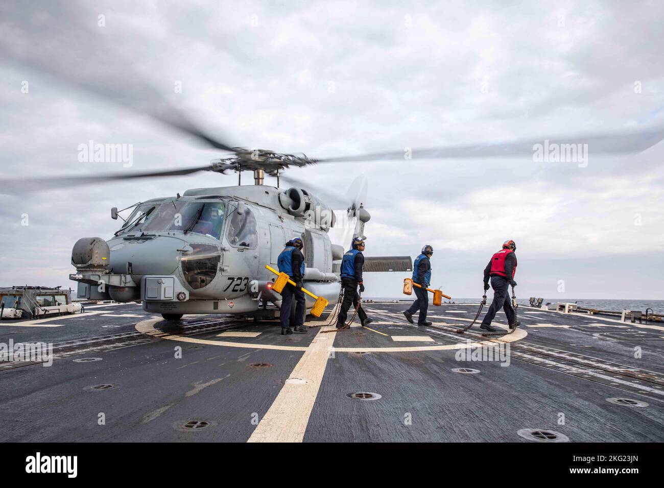 BALTIC SEA (Oct. 24, 2022) Sailors remove chocks and chains from a MH ...