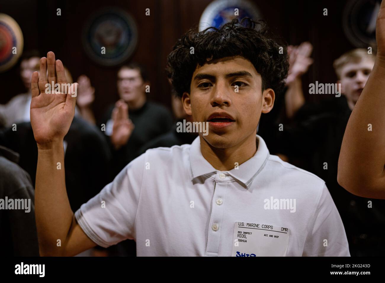 Future U.S. Marines recite the oath of enlistment before shipping off ...