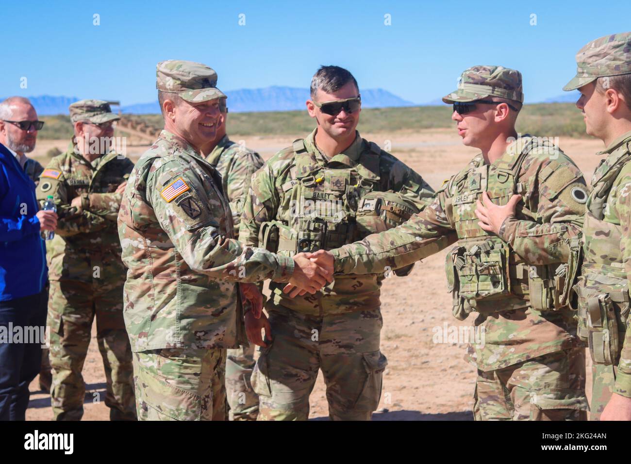 U.S. Army Brig. Gen. Thomas Moore II, left, Assistant Adjutant General ...
