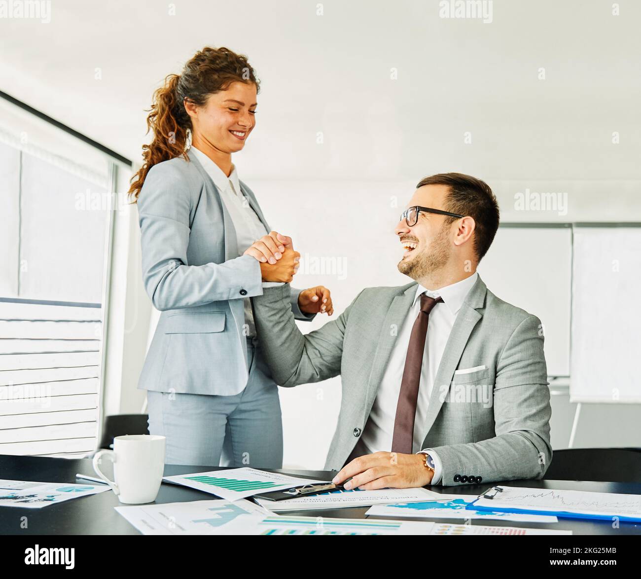 young business people meeting office teamwork celebrating success corporate shaking hands high ...