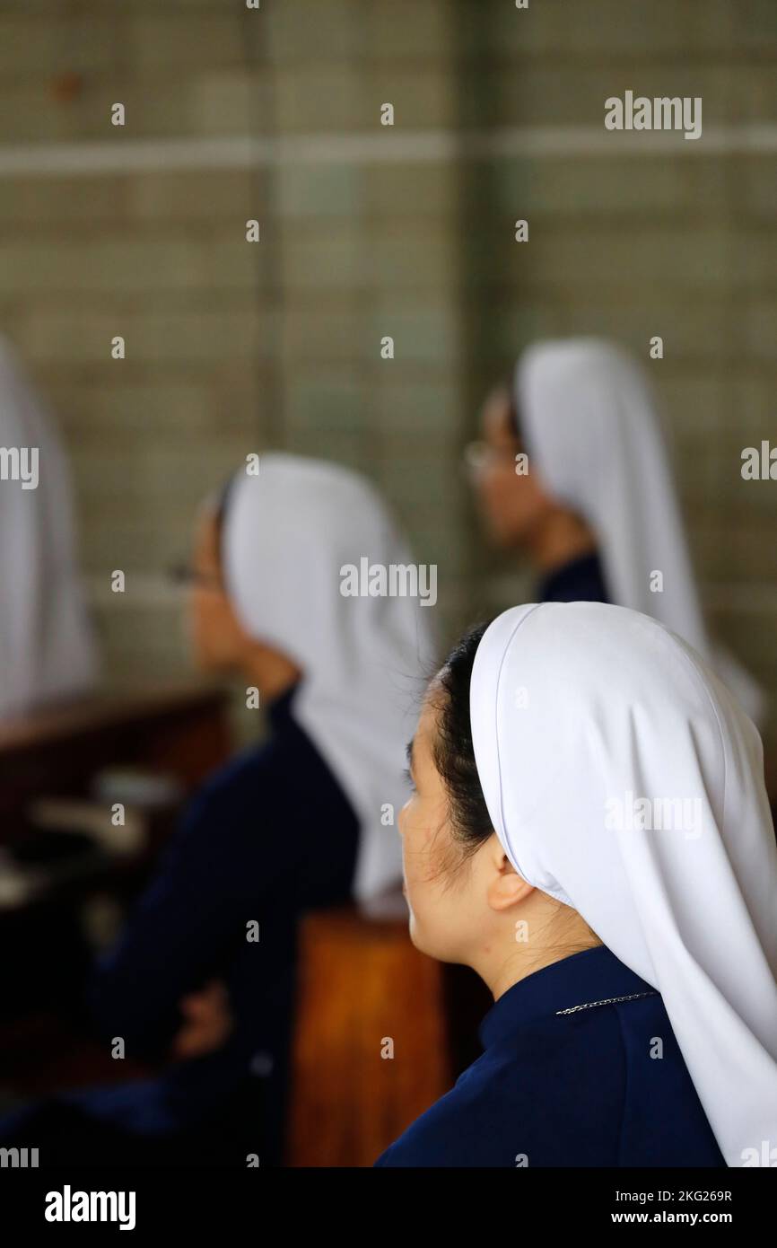 Catholic church. Dominican community. Catholc nuns at mass. Bien Hoa ...