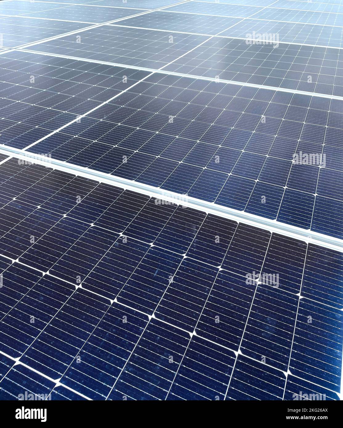 A vertical top view of solar panels on the roof Stock Photo - Alamy